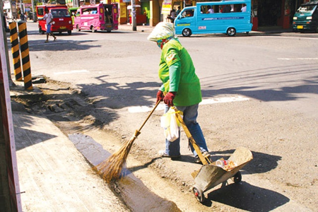 Street sweepers and traffic aides are given heat stroke break